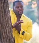 Black guy hiding behind tree Meme Generator