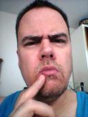 Crying man with gun Meme Generator